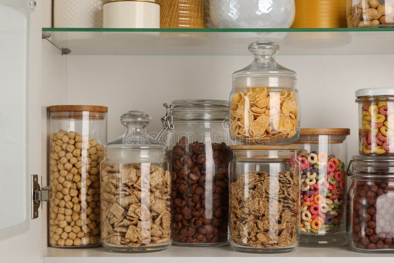 Glass Containers with Different Breakfast Cereals and Other Products on ...