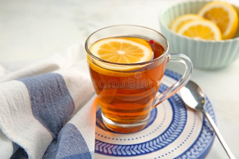 Glass Cup of Aromatic Tea with Lemon on Plate Stock Image - Image of ...