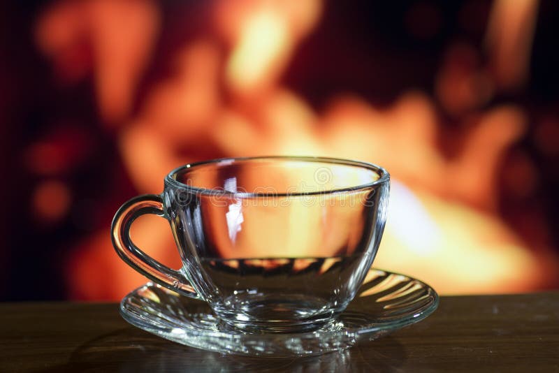 Glass Transparent Cup on the Background of Fire Fire Stock Image ...