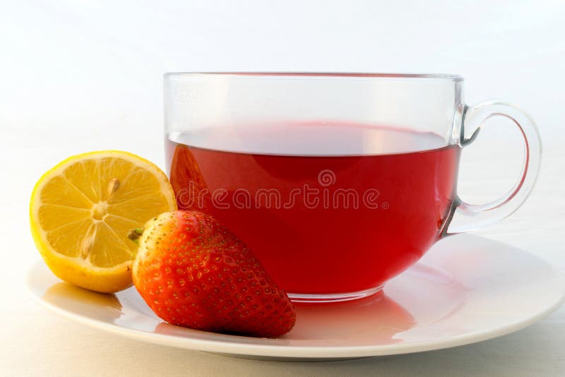 Glass Cup of Hot Aromatic Red Tea with Strawberry and Lemon Stock Photo ...