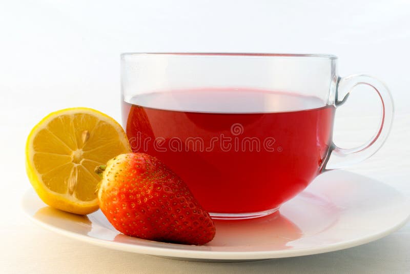 Glass Cup of Hot Aromatic Red Tea with Strawberry and Lemon Stock Photo ...