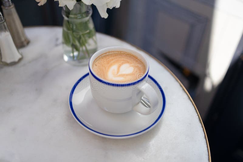 Glass Cup of Hot Coffee Cappuccino on White Marble Table in Street Cafe ... Glass Cup of Hot Coffee Cappuccino on White Marble Table in Street Cafe ...