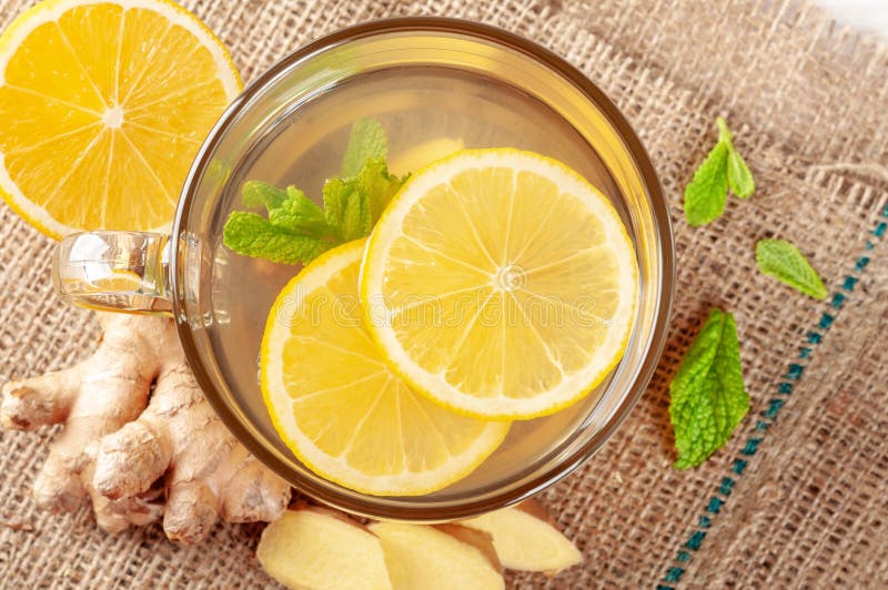 Glass Cup of Hot Ginger Tea with Lemon and Peppermint Stock Image ...