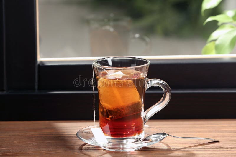 Glass Cup of Hot Tea on Wooden Window Stock Image - Image of full ...