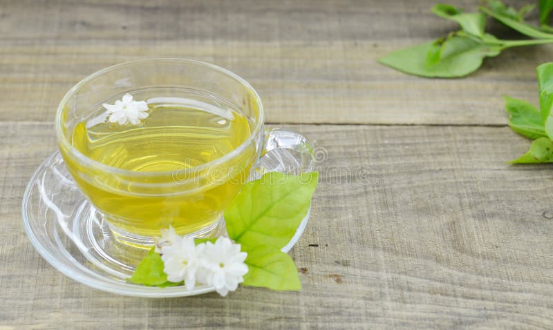 Glass Cup with Jasmine Tea on Wooden Table Stock Photo - Image of ...