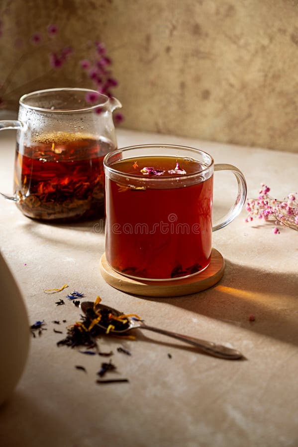 Glass Cup of Loose Black Leaf Tea with Dried Flowers. Drinking Tea ...
