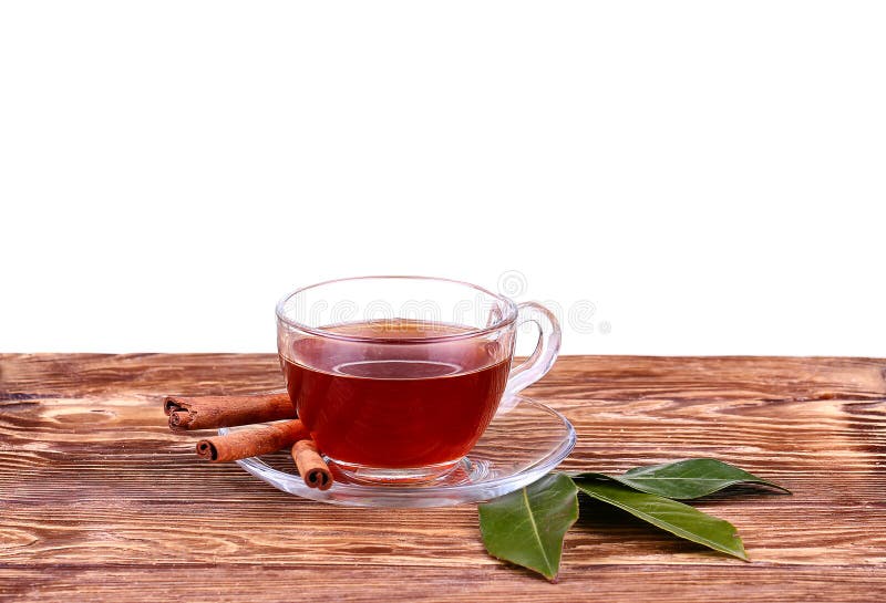 Glass Cup of Tea with Cinnamon Sticks Isolated on White Stock Image ...
