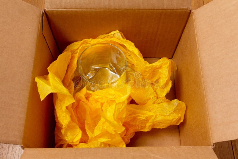 Glass in a cardboard box stock image. Image of online - 204568503