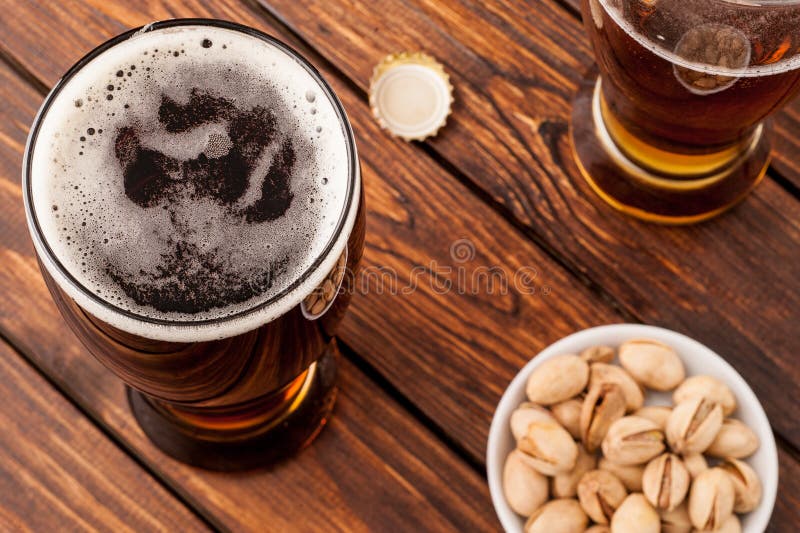 Beer and nuts stock image. Image of full, autumn, life - 26905705
