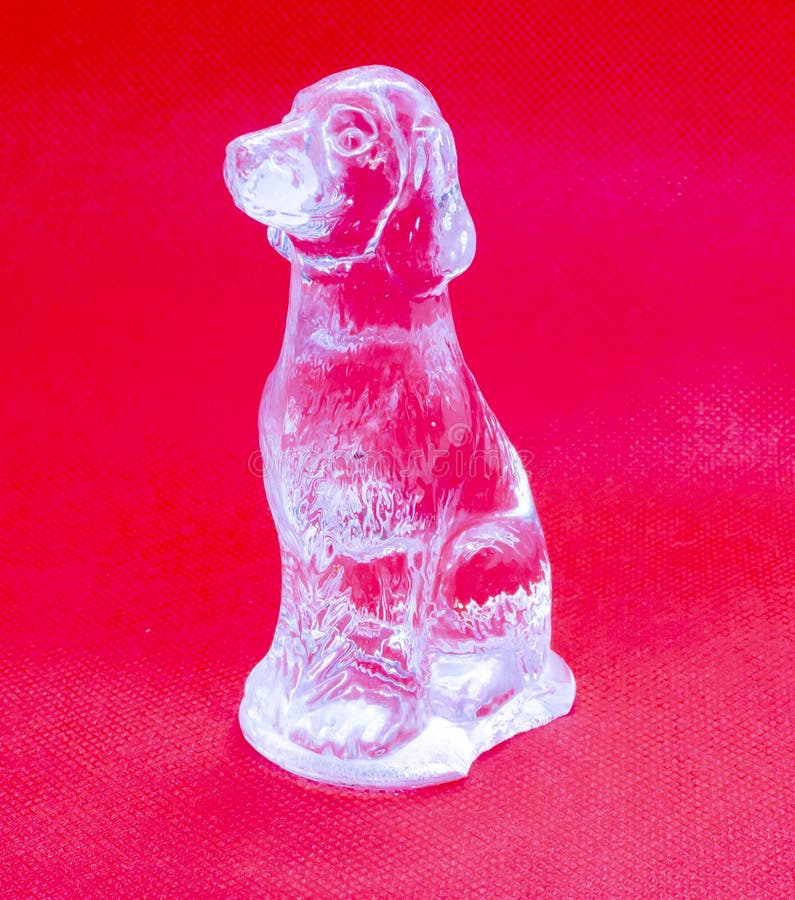 Glass Dog Figurine on a Red Background Stock Image - Image of glass ...