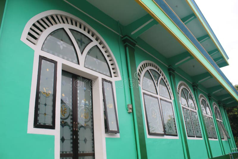 Glass Doors and Green Walls of a Mosque Stock Photo - Image of building ...