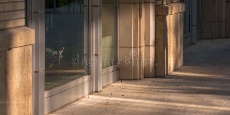Glass Doors Reflecting Sunlight on the Street Stock Image - Image of ...