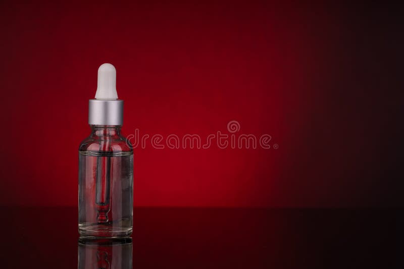 Glass Dropper Bottle Silver Cap Red Background Stock Photos - Free ...