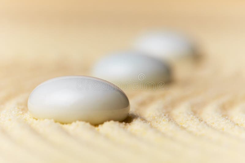 Glass Drops on Sand Surface Stock Photo - Image of glass, mellow: 12248892