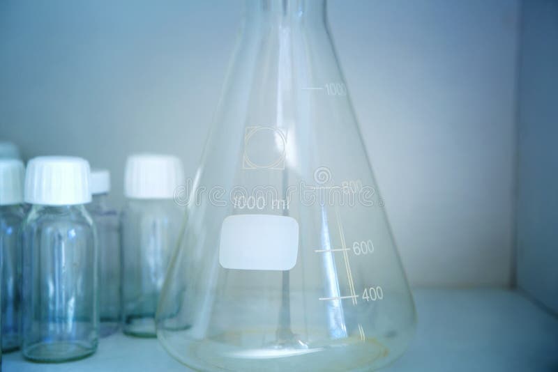 Empty Chemical Bottles in Laboratory Stock Photo - Image of instrument ...