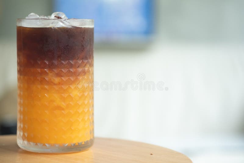 A Glass of Espresso Shot Mixed with Orange Juice Stock Image - Image of ...
