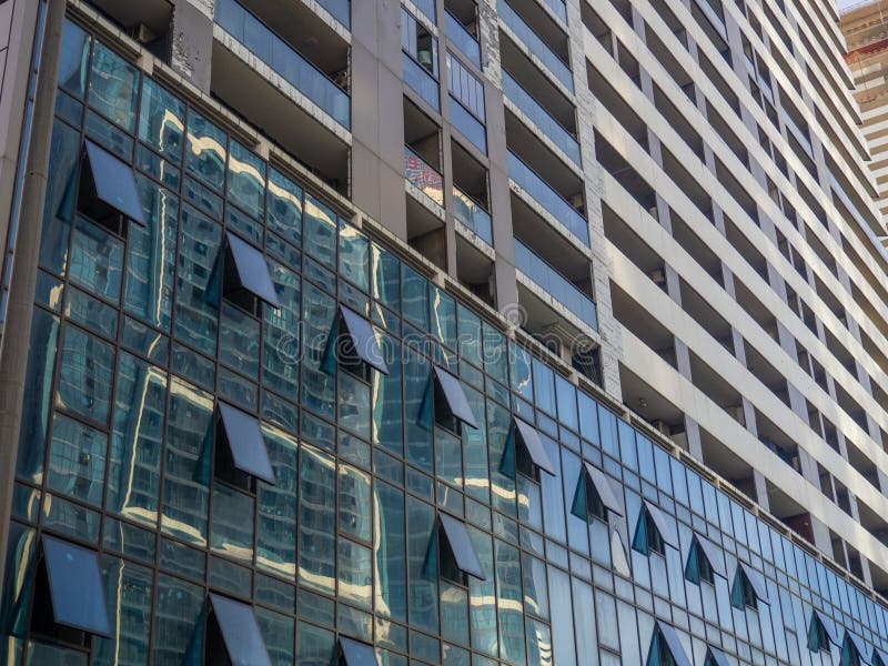 Glass Facade of a House Under Construction with Open Windows. Unwashed ...