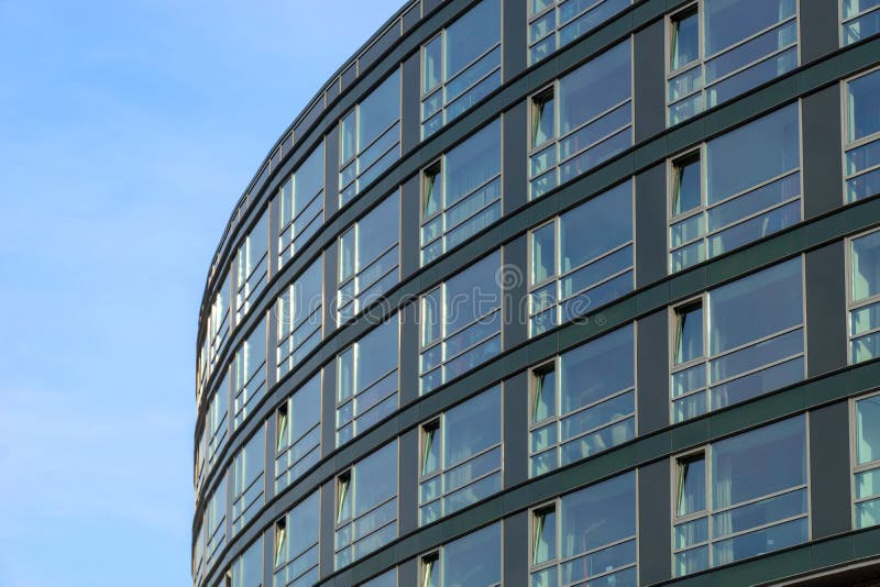 Glass Facade of a Modern Building Stock Image - Image of round, civil ...