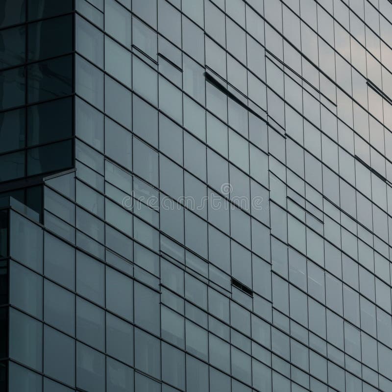 Glass Facade of a Modern Skyscraper, Featuring a Grid-like Pattern ...