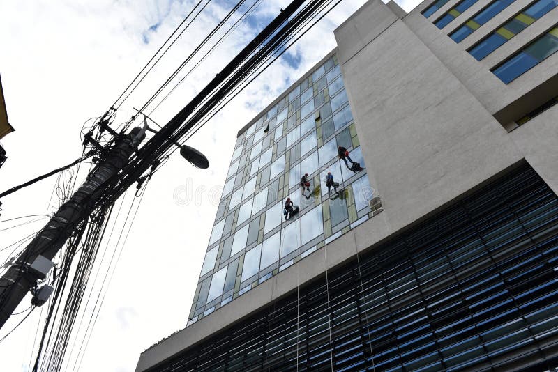 Glass Facade Skyscrapper Window Cleaners Hanging on Rope Stock Image ...