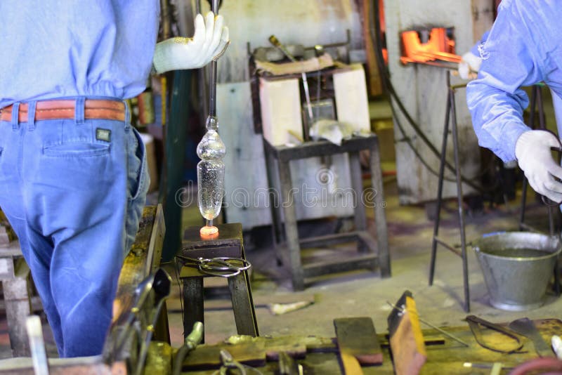 Glass Factory Worker Processing Red Hot Glass Stock Photo - Image of ...