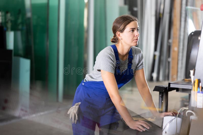 Glass Factory Worker at Workplace with Control Panel, Controlling ...
