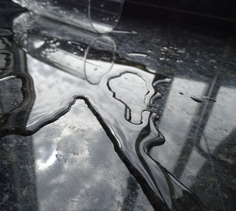 Glass Fallen on Granite and Spilled Water Stock Image - Image of water ...