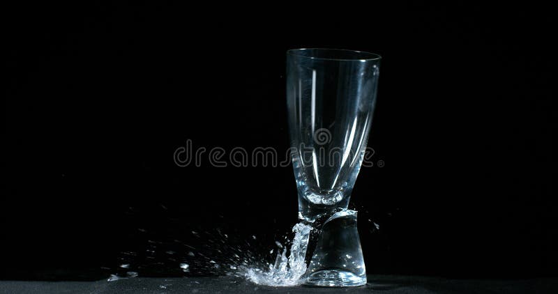 Glass Falling and Exploding on Black Background Stock Image - Image of ...