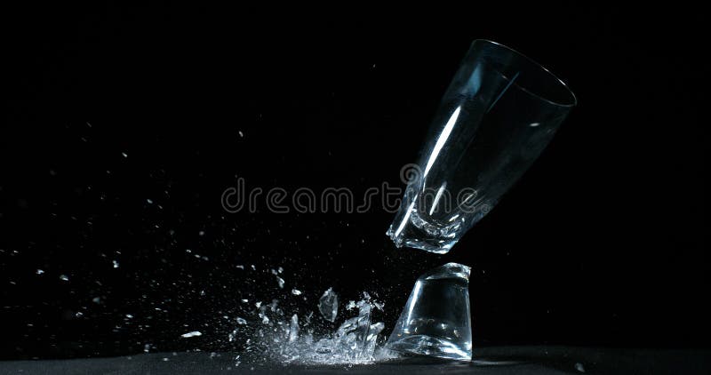 Glass Falling and Exploding on Black Background Stock Photo - Image of ...