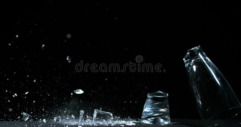 Glass Falling and Exploding on Black Background Stock Image - Image of ...