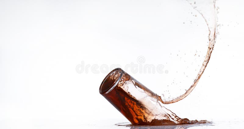Glass Falling and Red Wine Splashing Against White Background Stock ...