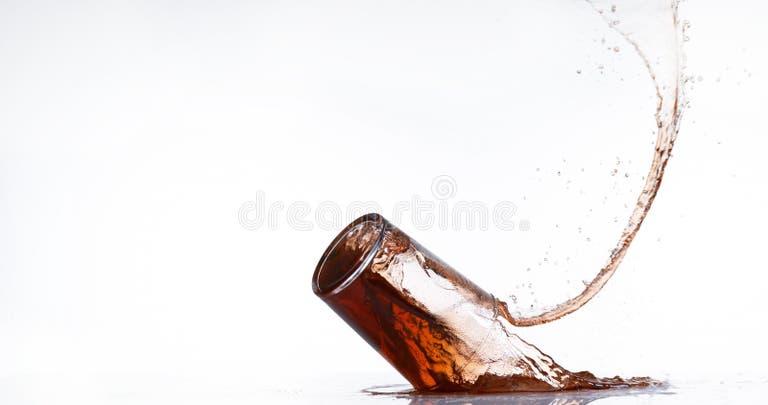 Glass Falling and Red Wine Splashing Against White Background Stock ...