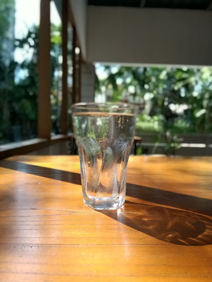 Glass fill with ice water stock photo. Image of water - 250914138