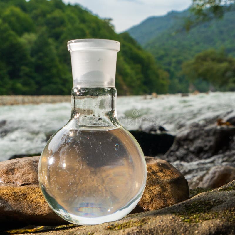 Glass Flask with Clean Drinking Water Stock Image - Image of brookside ...