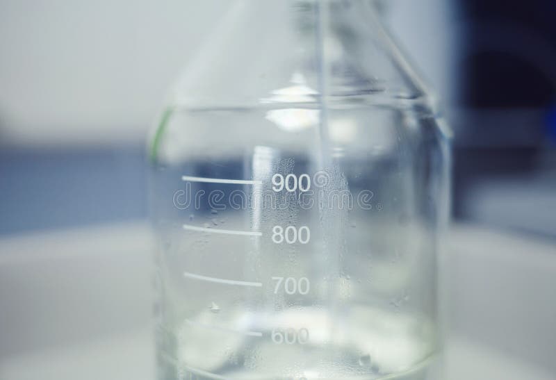 A Flask with a Liquid Culture of Bacteria Next To the Test Tubes. Stock ...