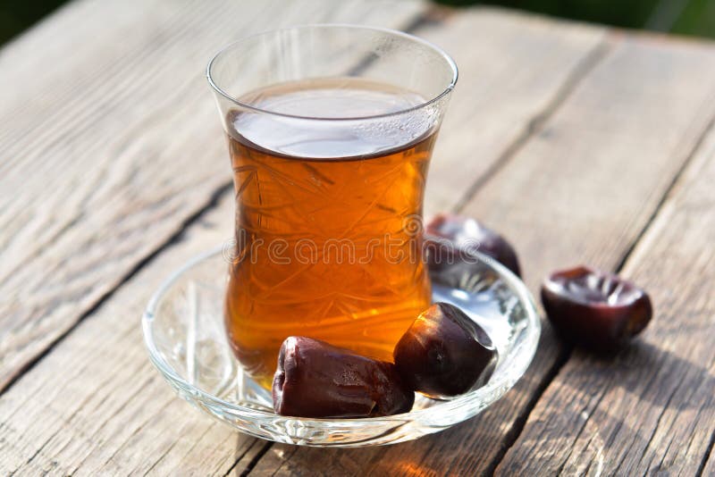 Glass of Fragrant Tea with Dates Stock Photo - Image of armud, samovar ...