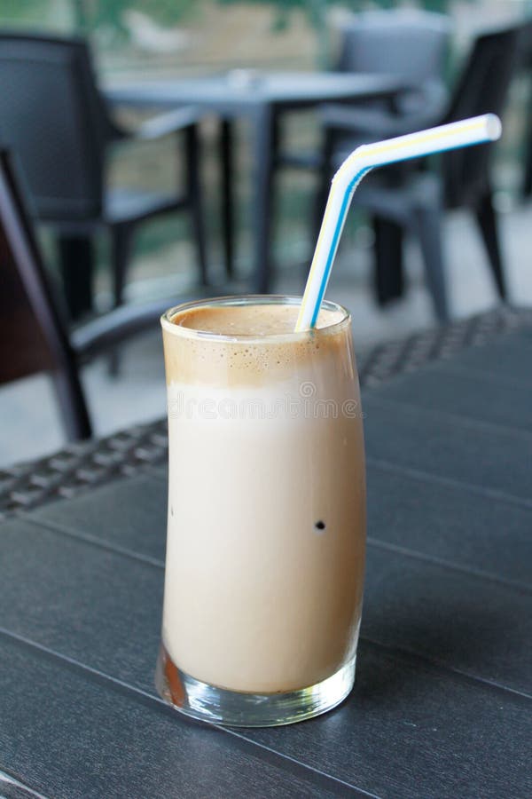 Glass of Frappe Coffee stock image. Image of chair, leisure - 63493553