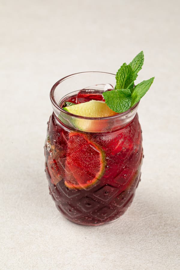 Glass of Fresh Berry Tea with Mint and Ice Stock Photo - Image of juicy ...