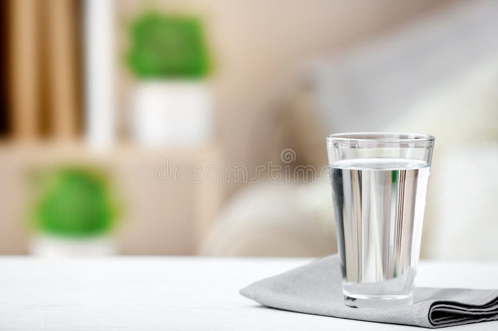Glass of Fresh Cold Water on Table in Room Stock Image - Image of fresh ...
