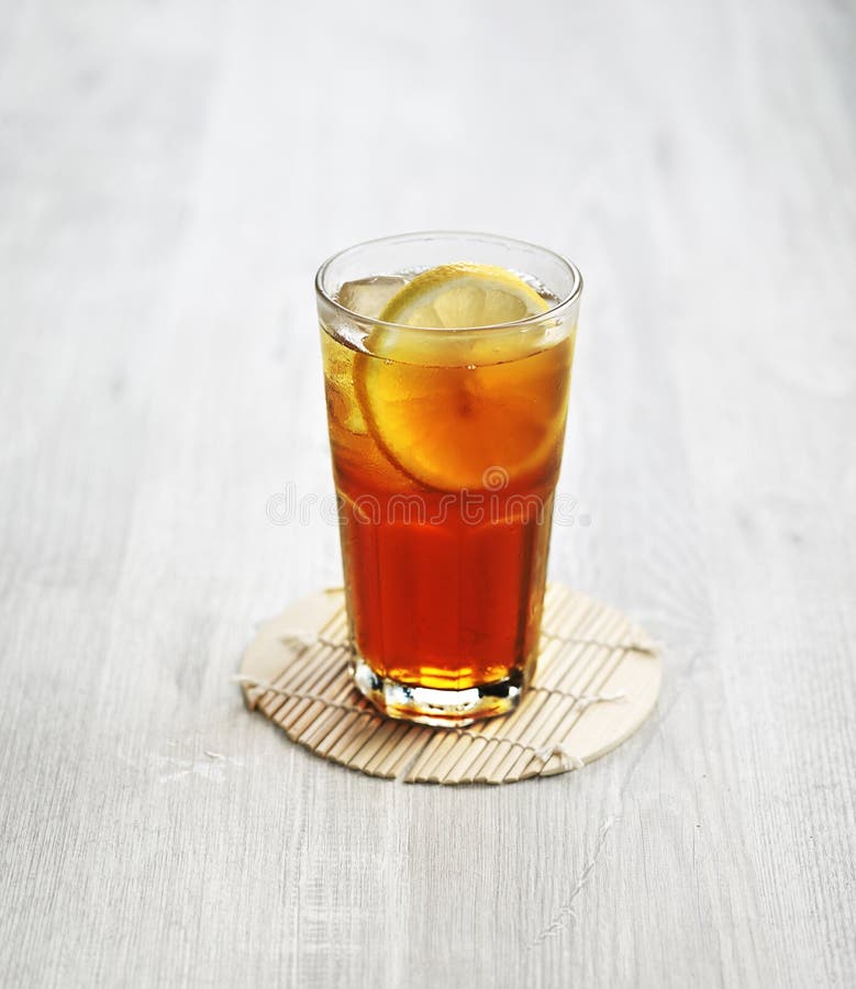 A Glass of Fresh Iced Lemon Tea with Lemon Slice Isolated on Grey ...