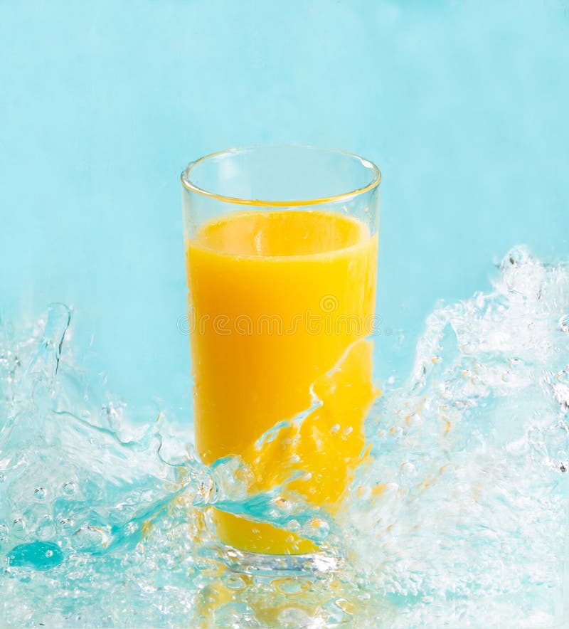 Glass of Fresh Orange Juice in Splashes of Water Stock Image - Image of ...