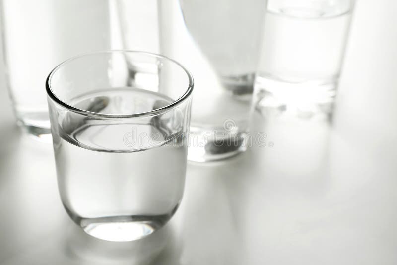 Glass of Fresh Water on Grey Table Stock Photo - Image of freshness ...