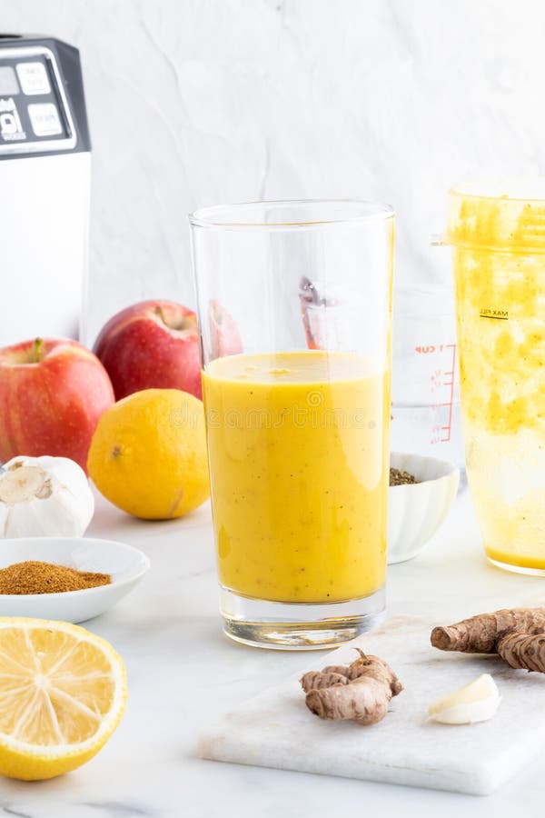 A Glass of Freshly Made Turmeric Detox Elixir, Ready for Drinking ...