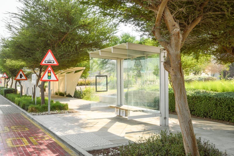 Glass-fronted Bus Stop on the Sidewalk at the Side of the Street Stock ...