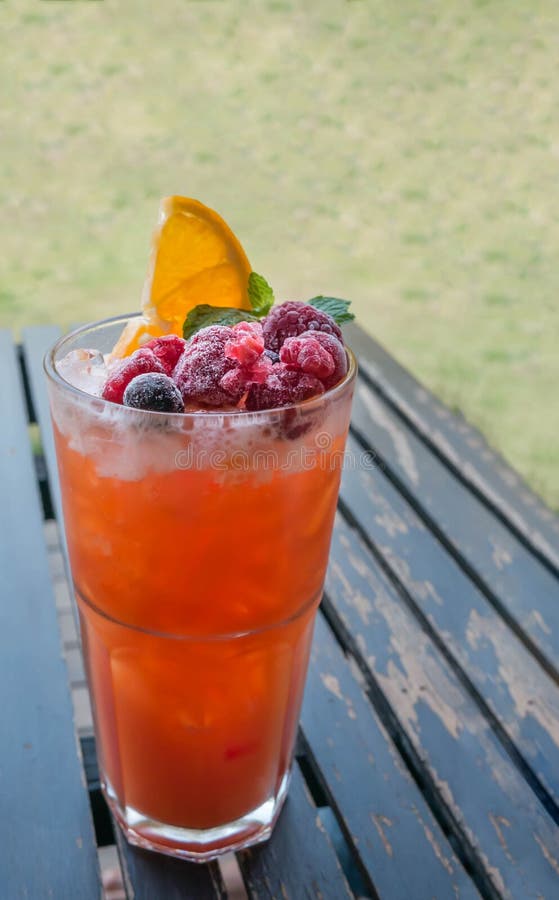 Glass of fruit punch stock photo. Image of liquid, fruit - 74143732