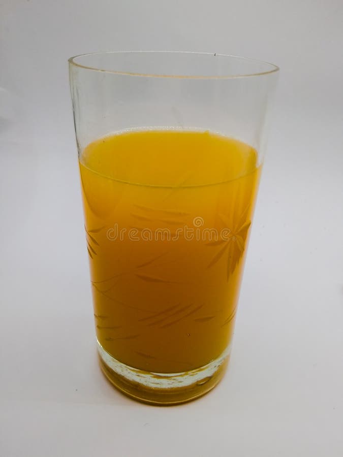 A Glass Full of Energetic Orange Juice in a White Background Stock ...