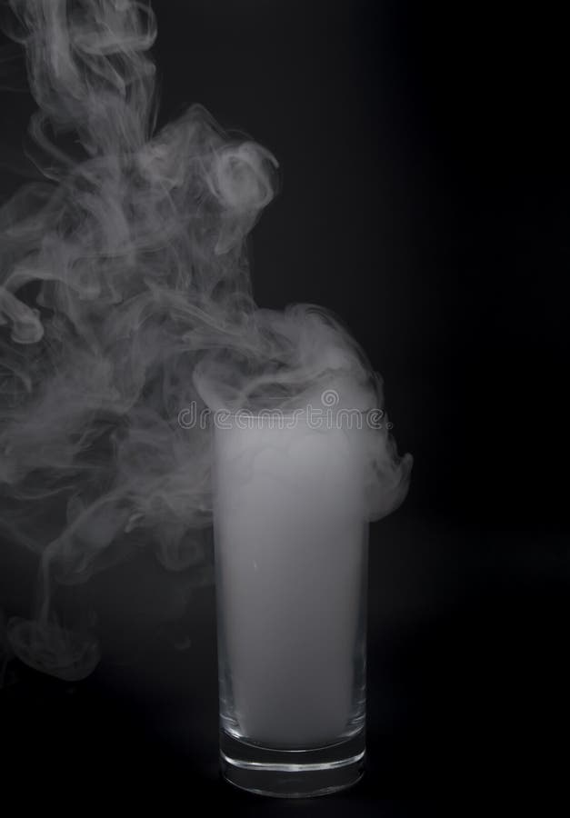 Glass Full of Smoke on a Dark Background Stock Photo - Image of ...
