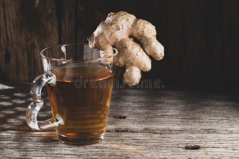 Glass with Ginger Tea on Old Wood, Space for Text Stock Photo - Image ...