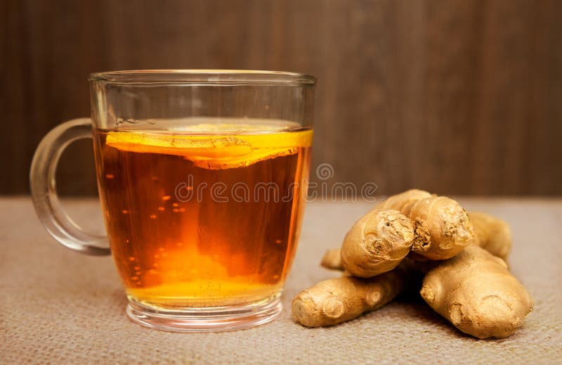 Glass of Ginger Tea and Raw Ginger on Jute Stock Photo - Image of cold ...