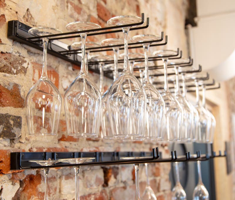 Glass Glasses on a Bar Near a Brick Wall Stock Image - Image of glass ...